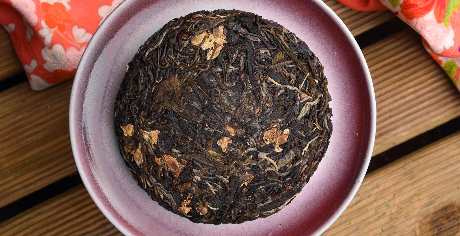 2022 Tea Flower Gu Hua Sheng Pu'er 100g Cake