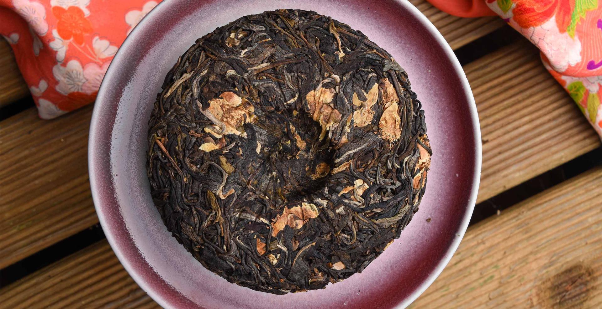 2022 Tea Flower Gu Hua Sheng Pu'er 100g Cake